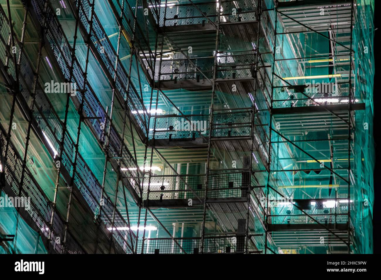 Scaffolding lit up at Night in Edinburgh Stock Photo - Alamy
