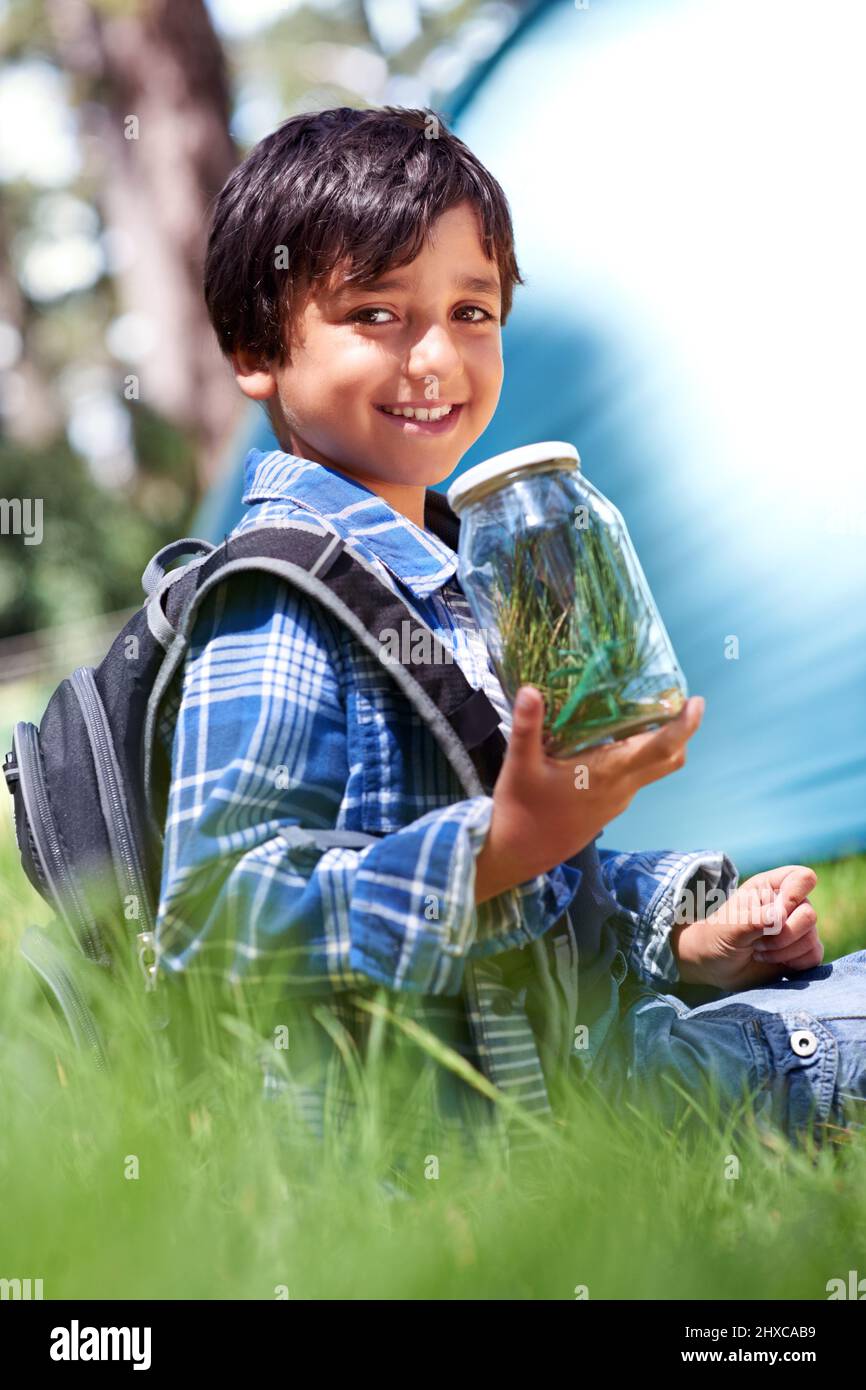 I cant wait for show-and-tell. Cute little boy collecting bugs in a jar ...