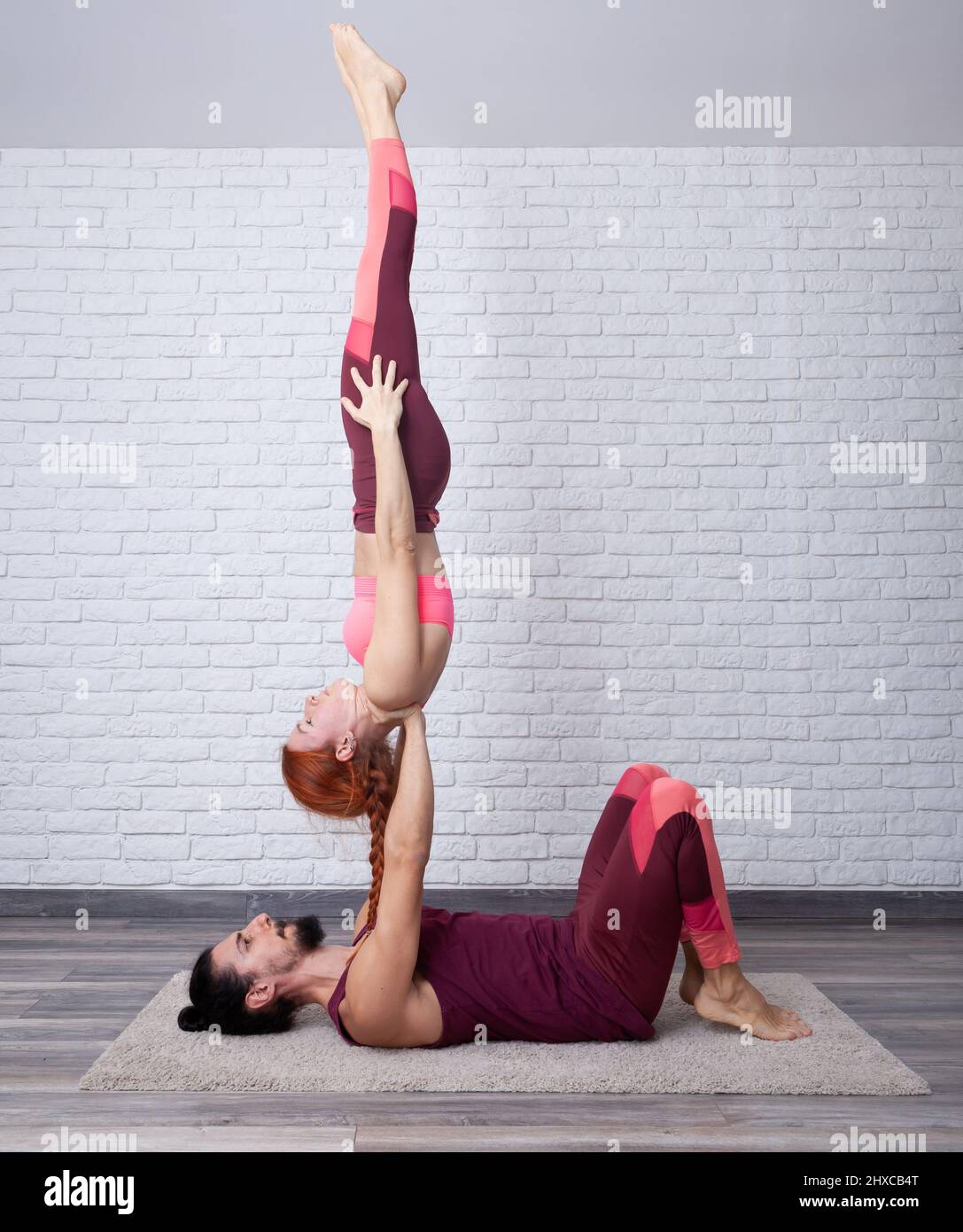 Free shoulder stand hi-res stock photography and images - Alamy