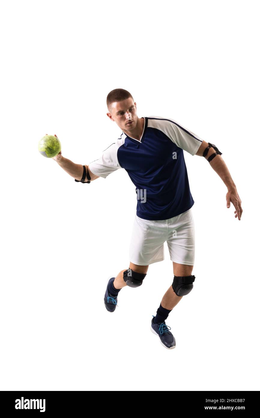 Full length of young male caucasian player playing handball while ...