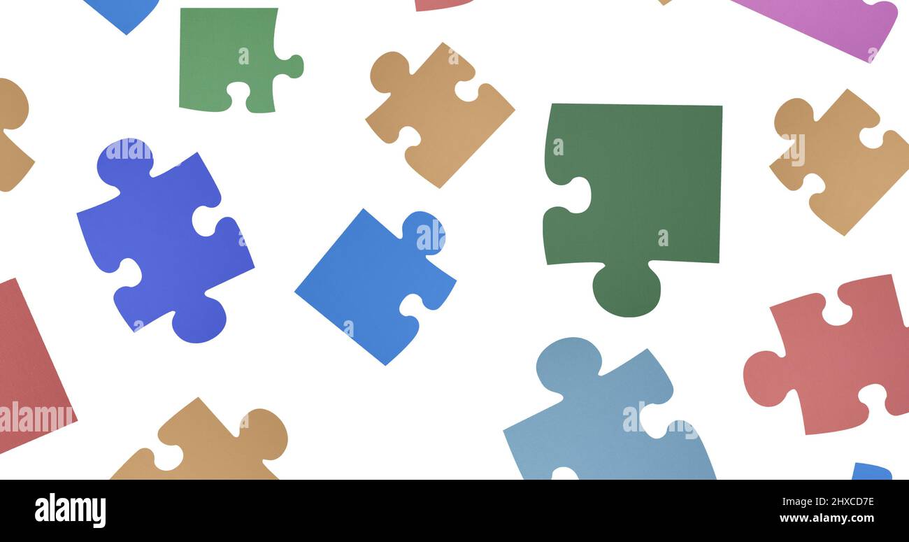 Image of colourful pieces of puzzle falling on white background Stock ...