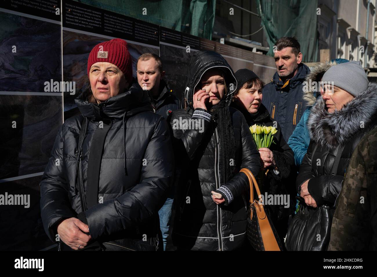 Lviv, Ukraine. 11th Mar, 2022. Women seen crying outside the Church ...