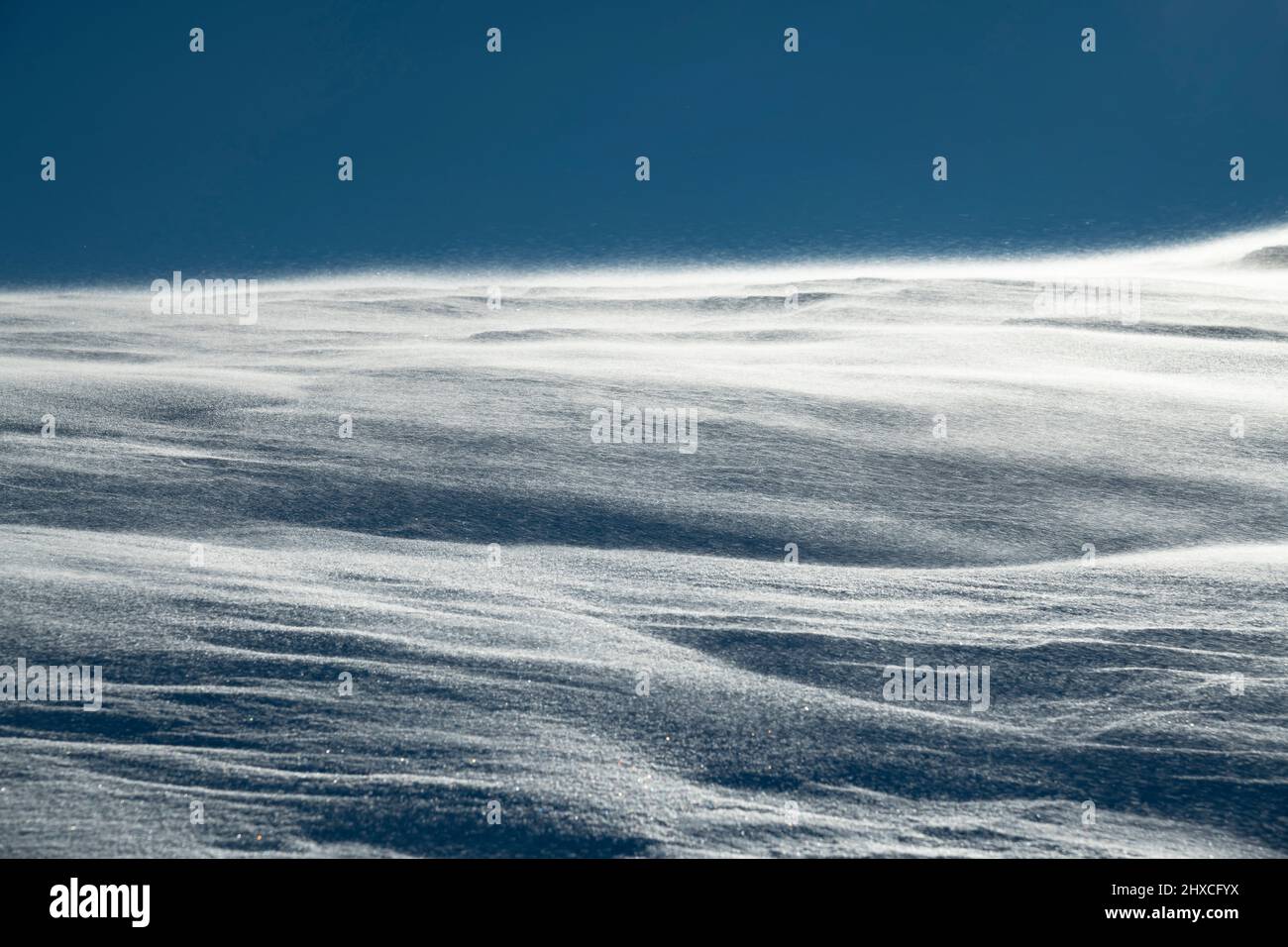 Snow swirled by the wind Stock Photo - Alamy