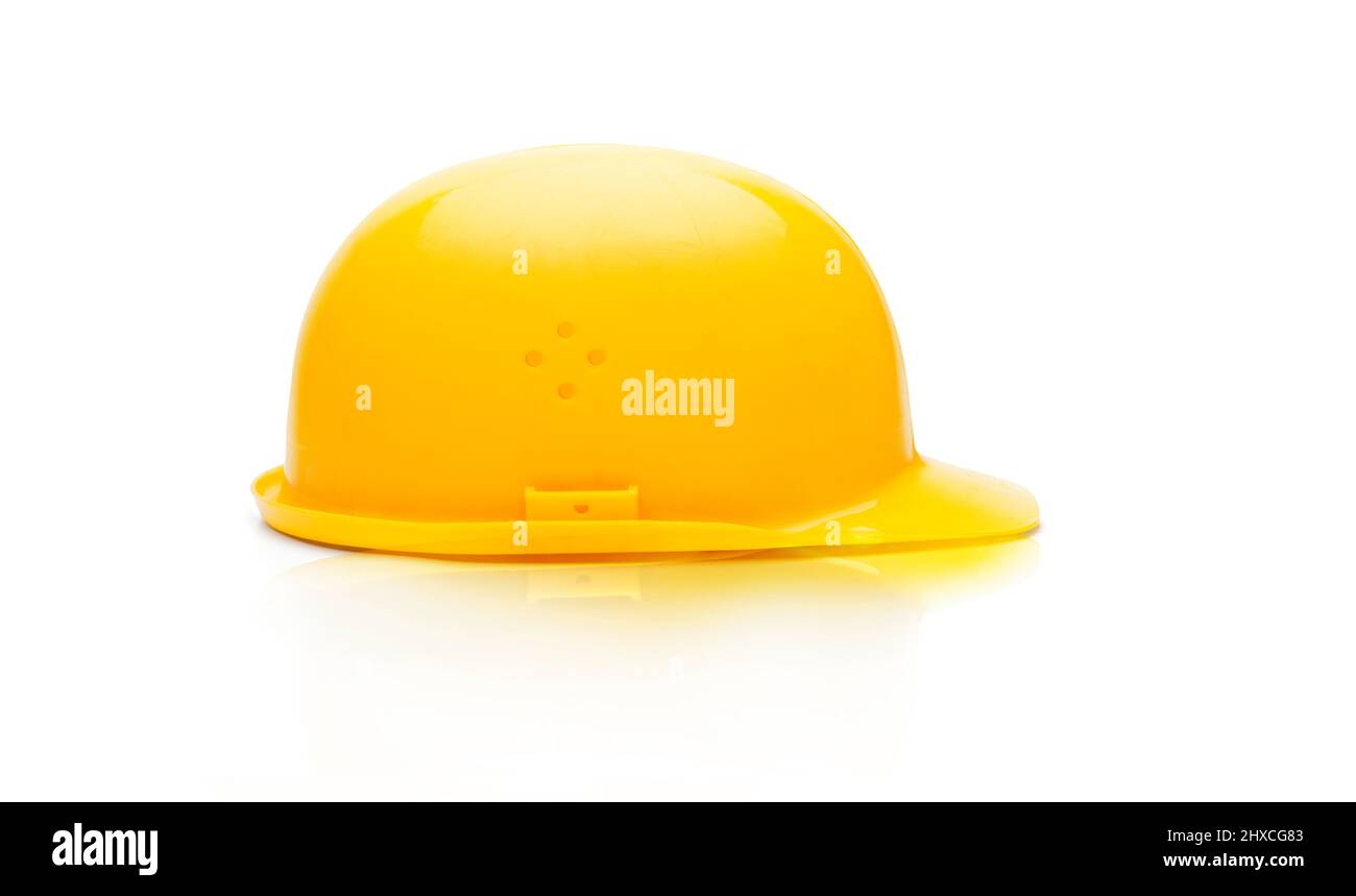 Yellow construction helmet isoliet on white background Stock Photo - Alamy