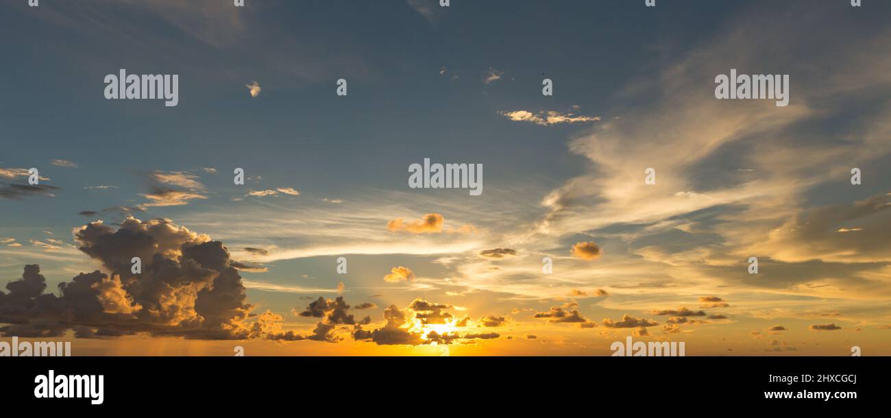 Evening sky with dramatic clouds over the sea. Dramatic sunset over the ...