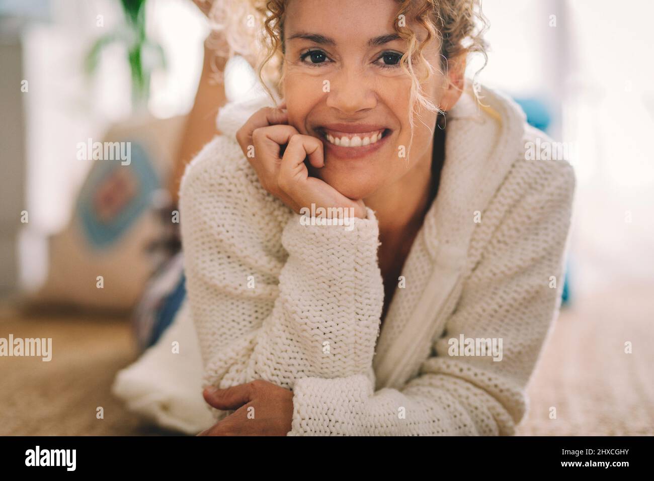 Woman, Smile, Curls, Rest head, Floor, lying Stock Photo - Alamy