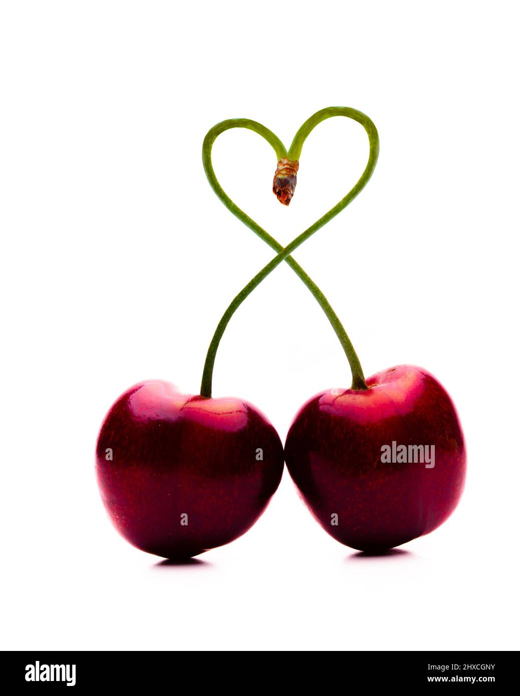 Dark red heart cherries mi heart shape isolated on white background ...