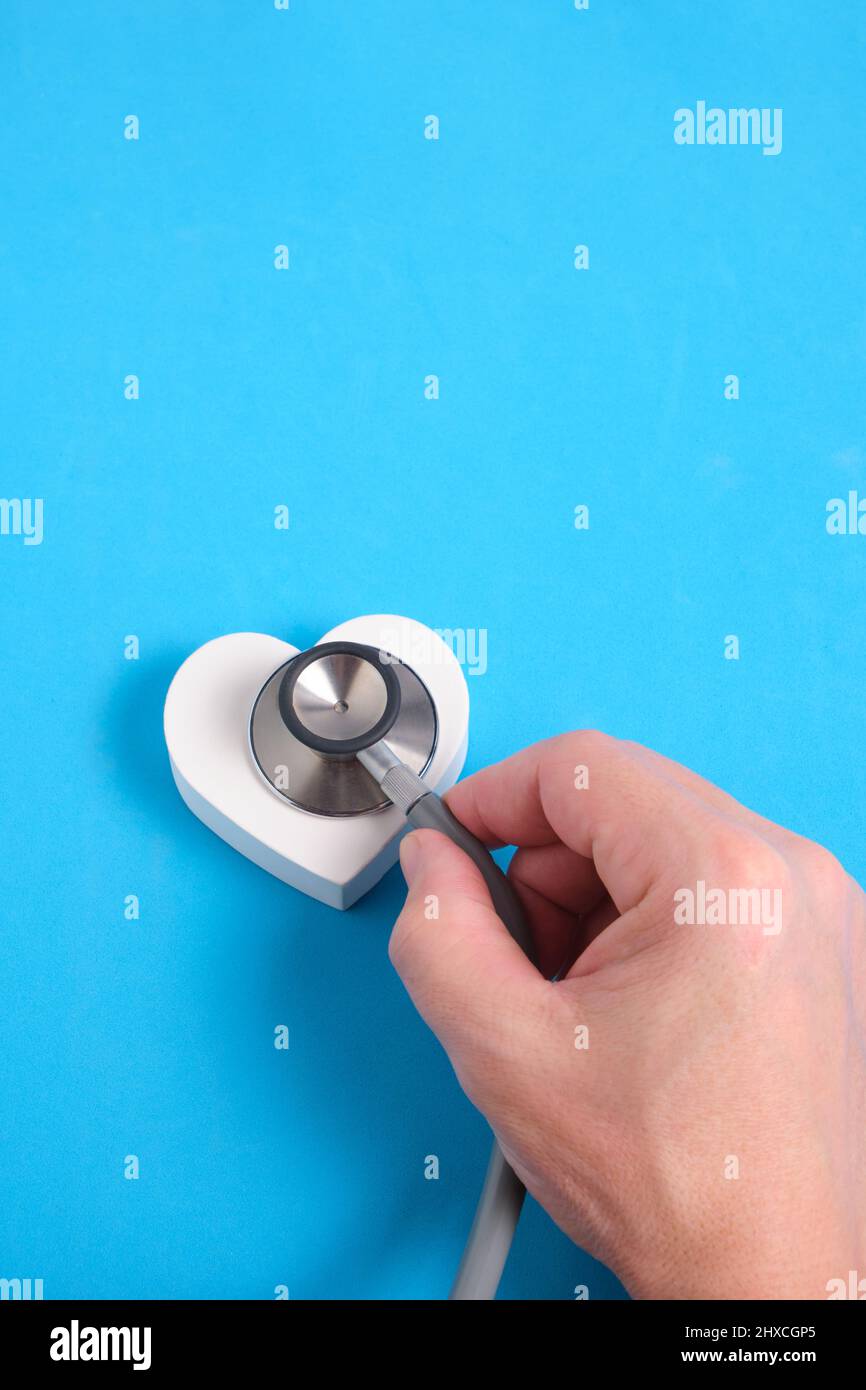 In hand stethoscope, listening heart.Medical examination heart Stock ...