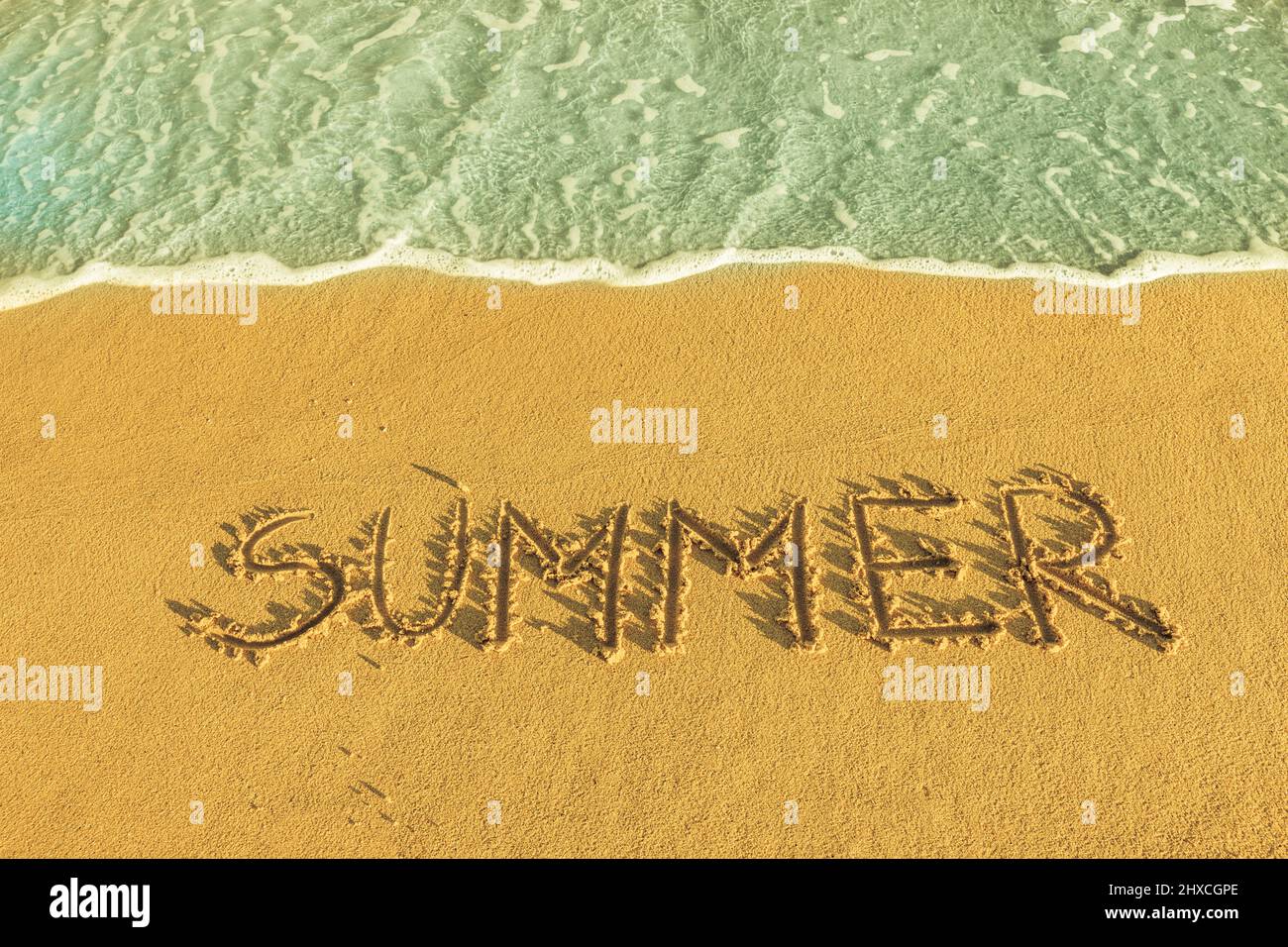 Words written in sand hi-res stock photography and images - Alamy