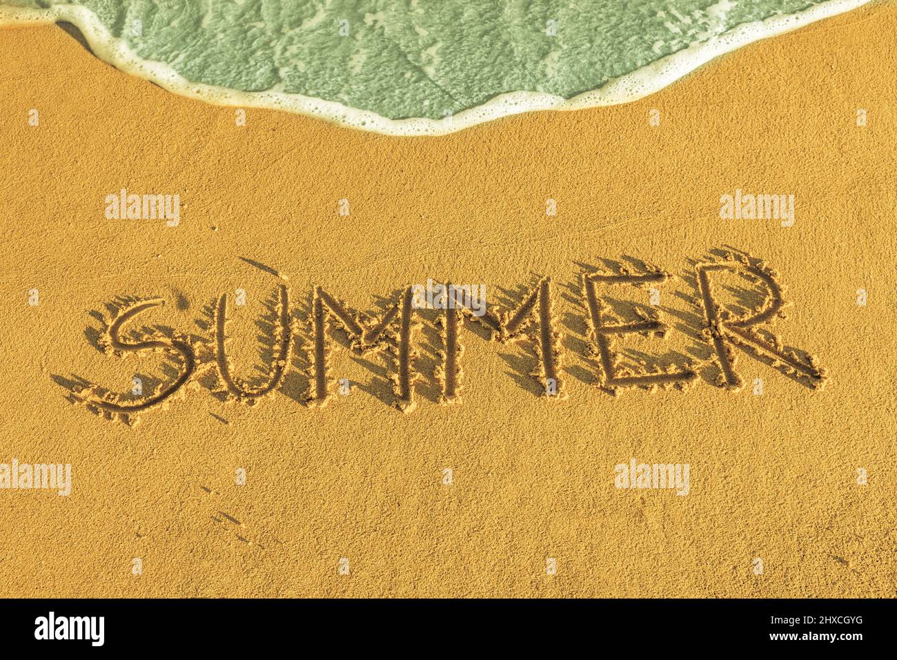 Summer Written In Sand High Resolution Stock Photography and Images - Alamy