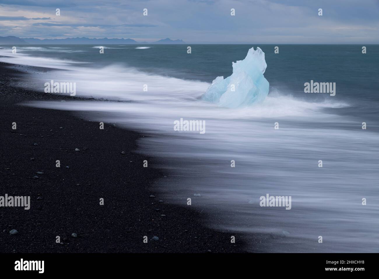 Ice and waves on black beach near jokulsarlon glacial lagoon hi-res ...