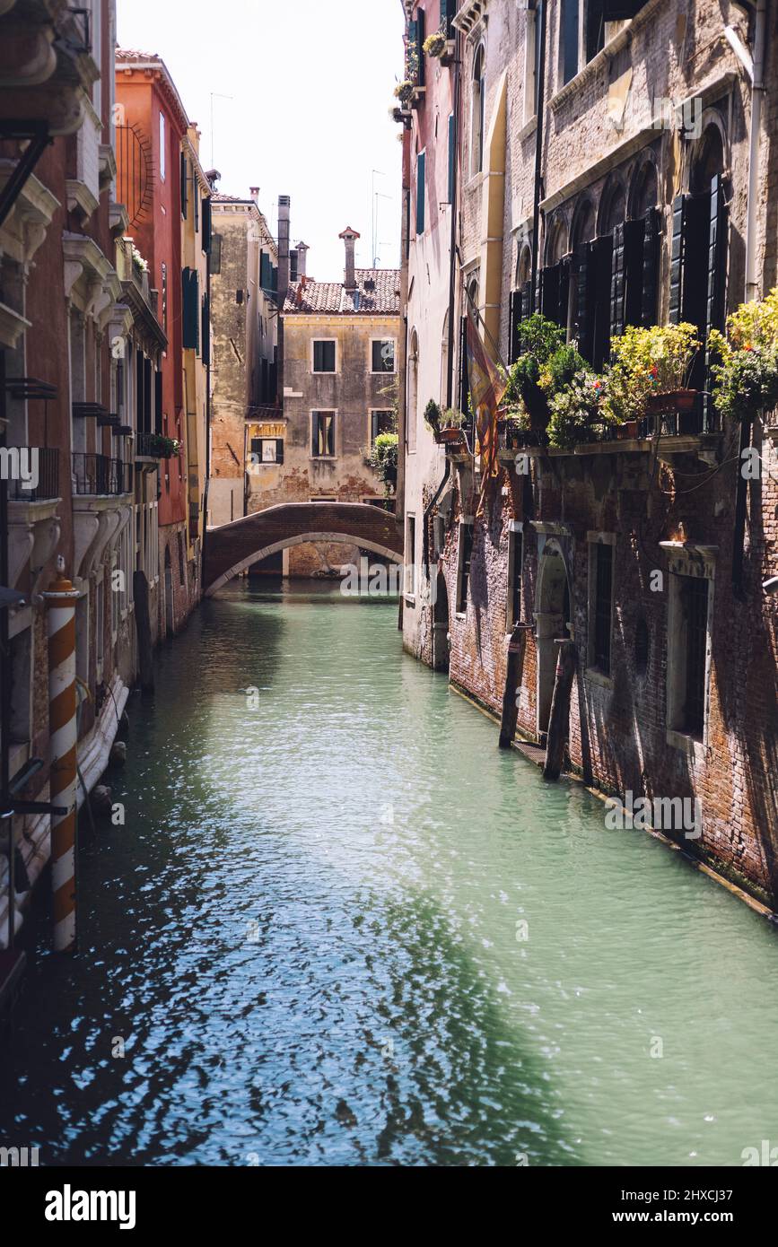 Bridge over a small canal in the old town of Venice, Italy Stock Photo ...
