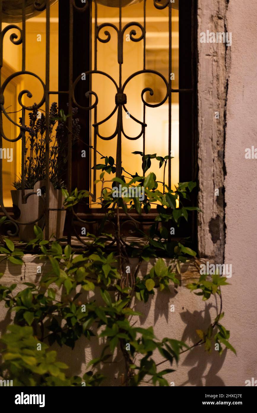 Looking through the window of an old house in the historic center of ...