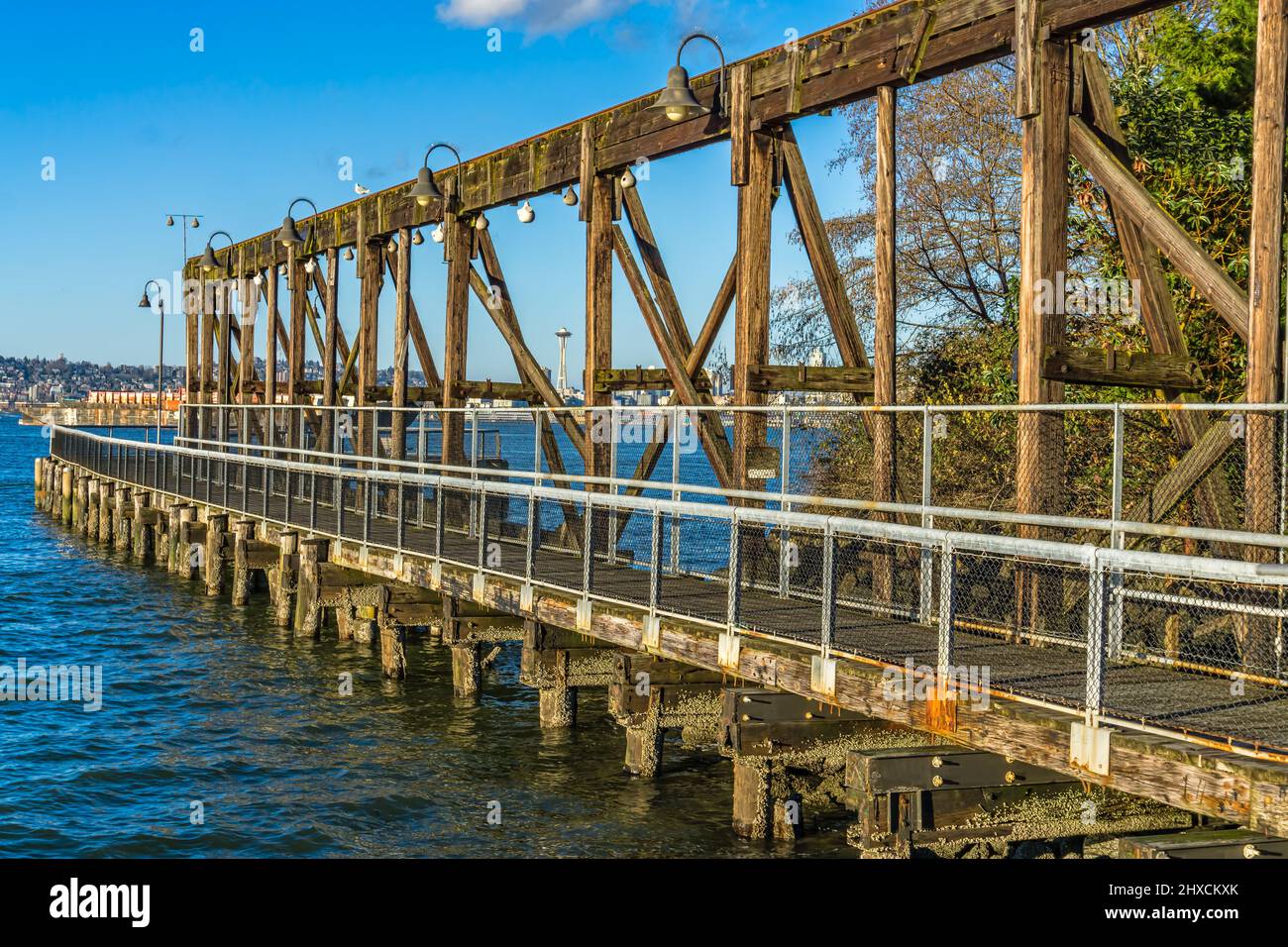 A wooden pier at Jack Block Park in West Seattle, Washington Stock ...