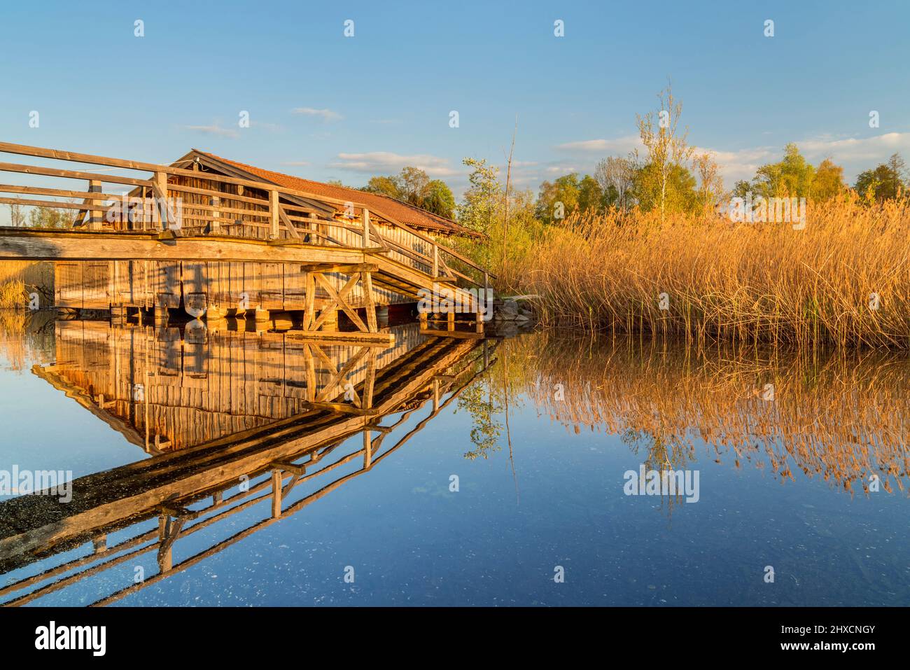 Bridge with boat huts at Staffelsee near Seehausen, Upper Bavaria ...