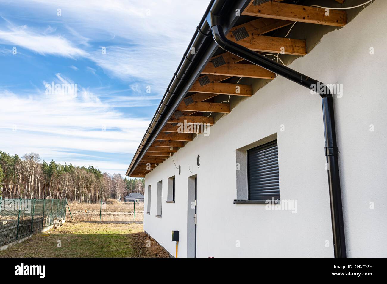 Roof trusses through which the electric cable passes to connect the ...