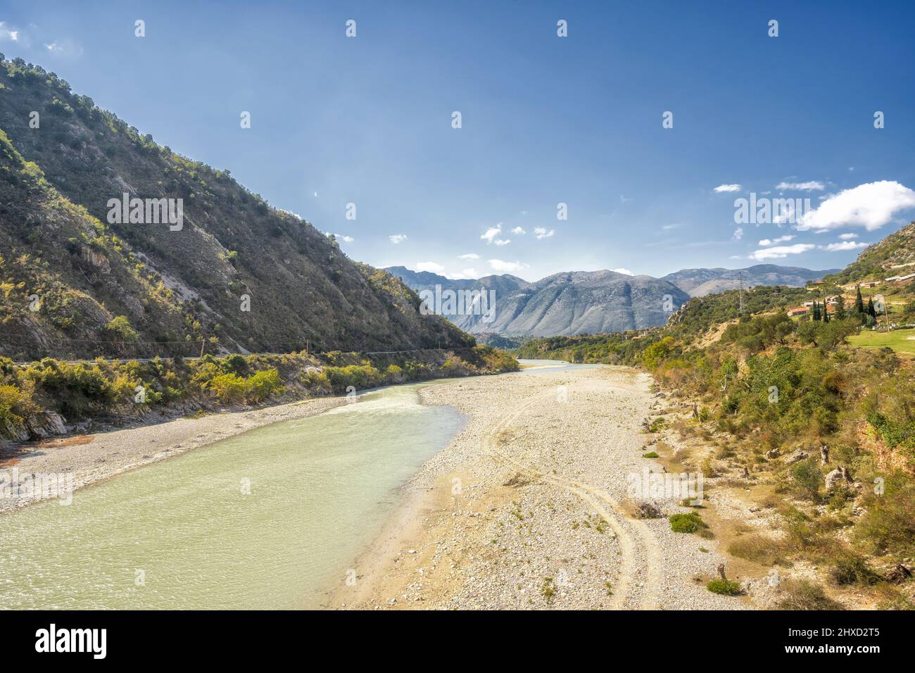 Beautiful mountain valley with gentle hills and river Stock Photo - Alamy