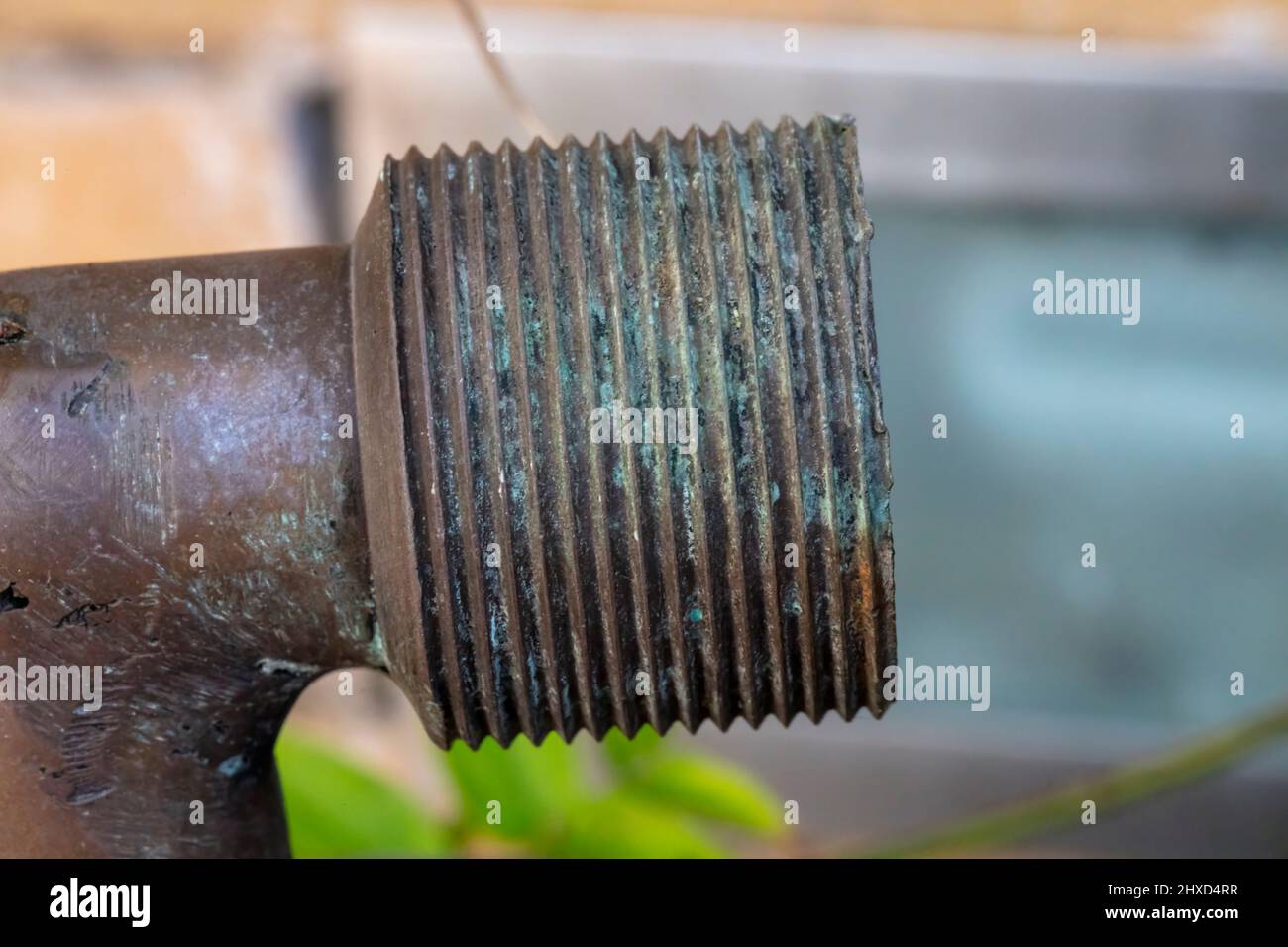Photograph of the female end of a copper pipe fitting with scratches ...