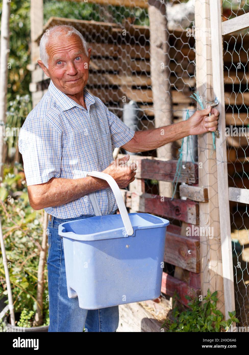 Man with hen hi-res stock photography and images - Alamy