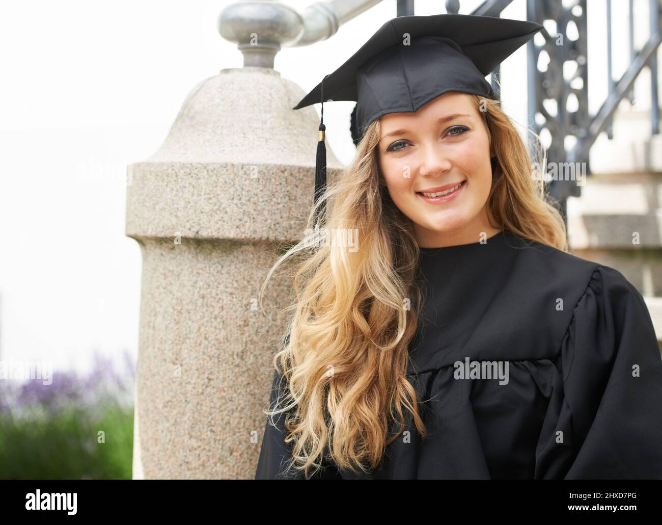 Looking forward to her future. Inspired young graduate after graduation ...