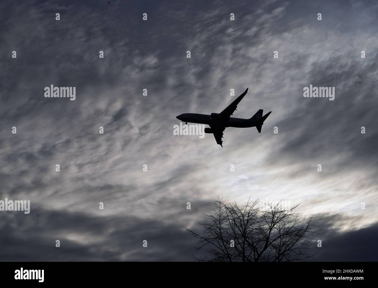 Airplane approaching its destination Stock Photo - Alamy