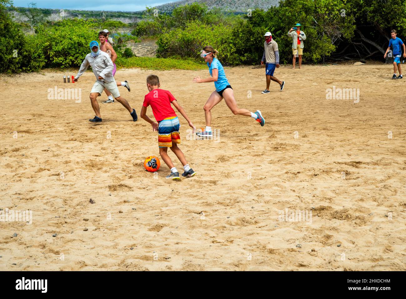 It's a tough match of football (soccer) featuring crew vs. guests at ...
