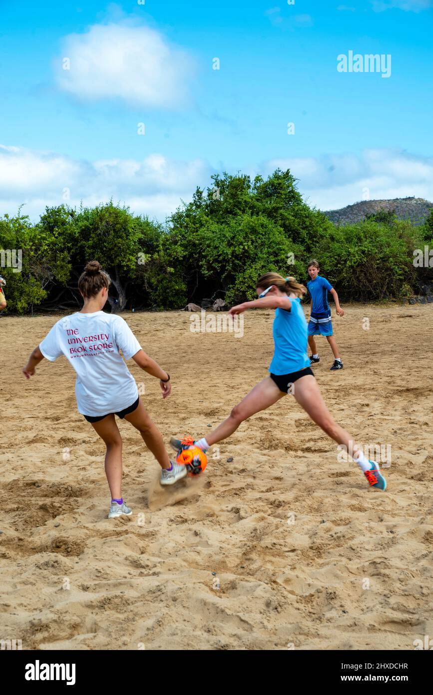 It's a tough match of football (soccer) featuring crew vs. guests at ...