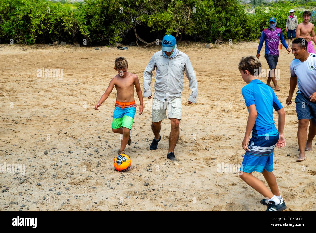 It's a tough match of football (soccer) featuring crew vs. guests at ...