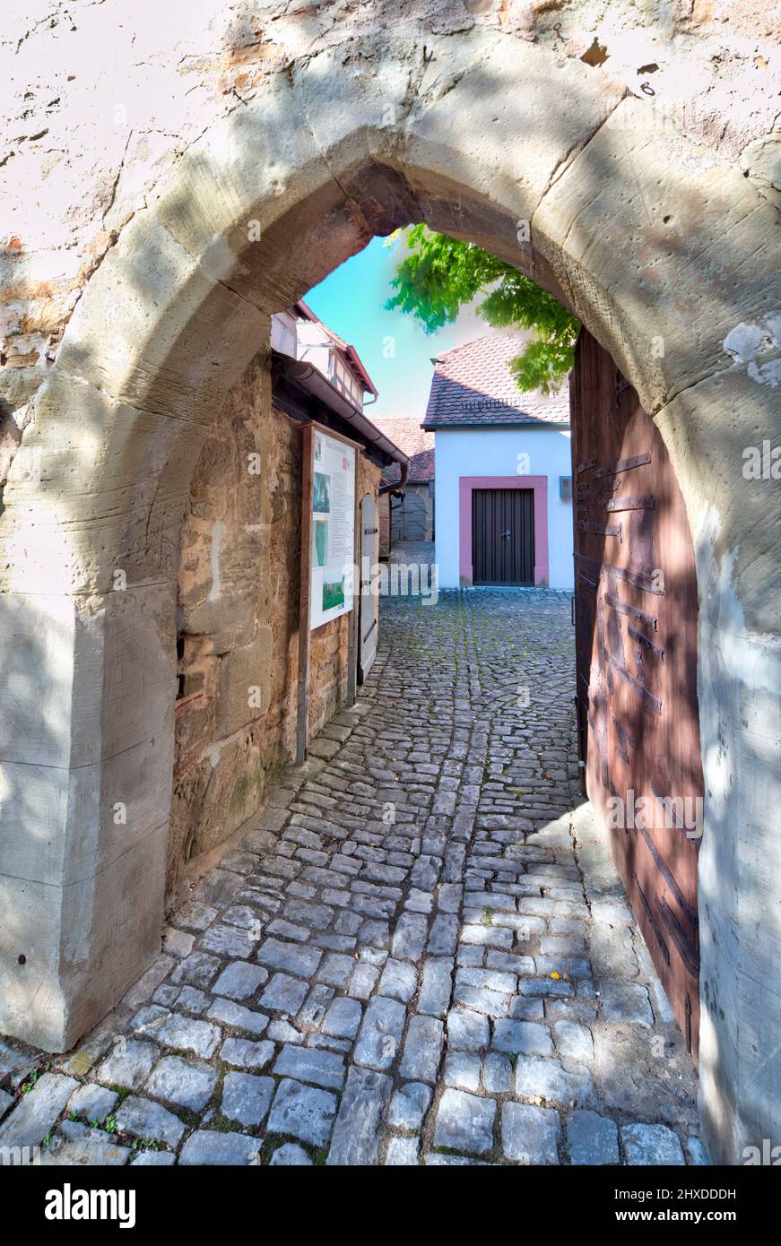 Church castle, pointed arch gate, house facade, autumn, market ...