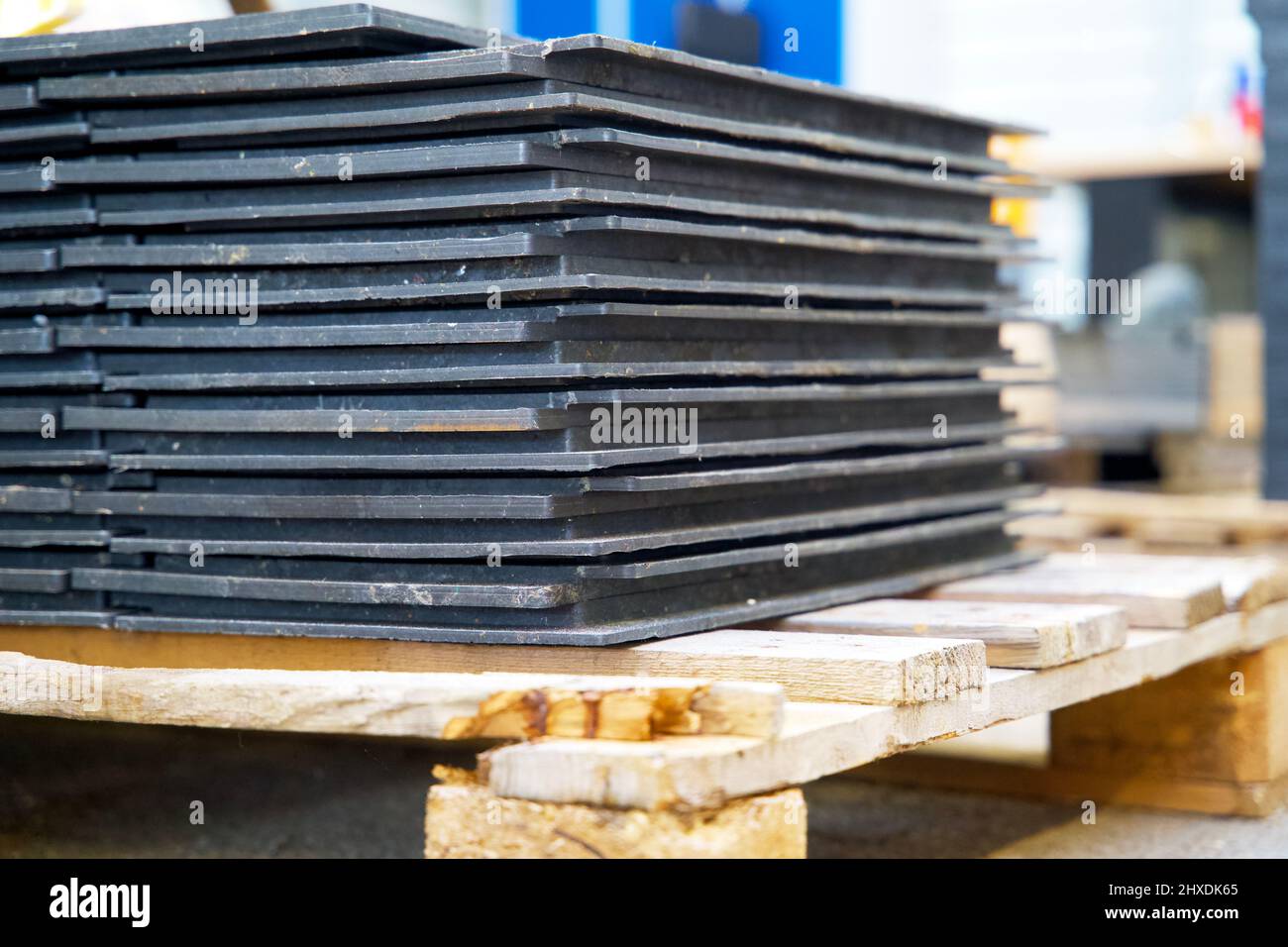 Pile of recycled plastic construction material made from restmix waste ...