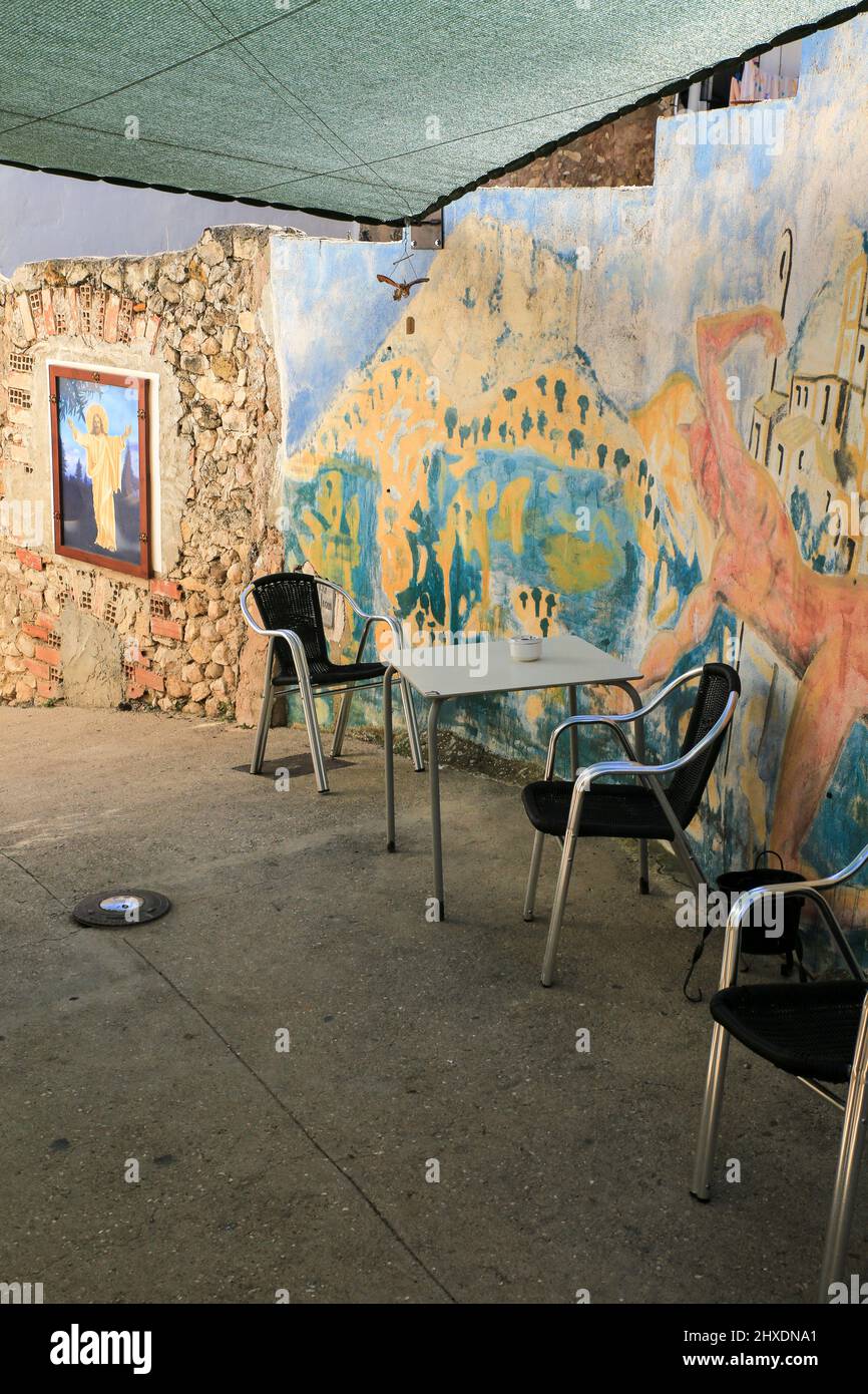 Bolulla, Alicante, Spain- February 4, 2022: Empty bar terrace with ...