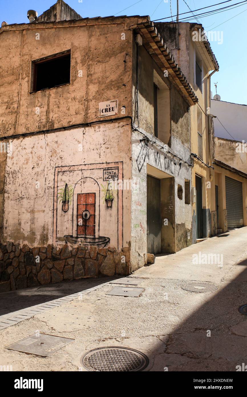 Bolulla, Alicante, Spain- February 4, 2022: Narrow Street and typical ...
