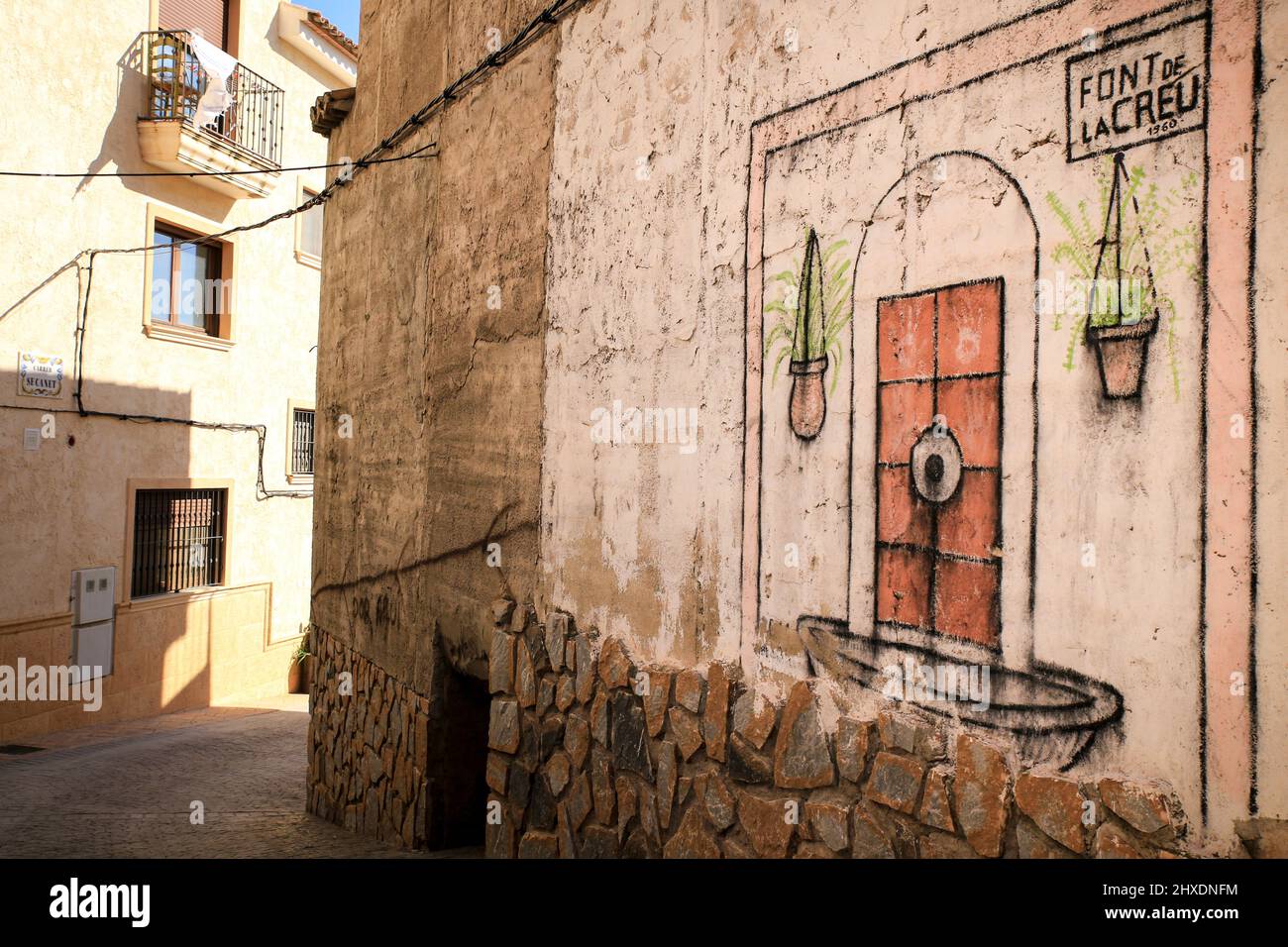 Bolulla, Alicante, Spain- February 4, 2022: Narrow Street and typical ...