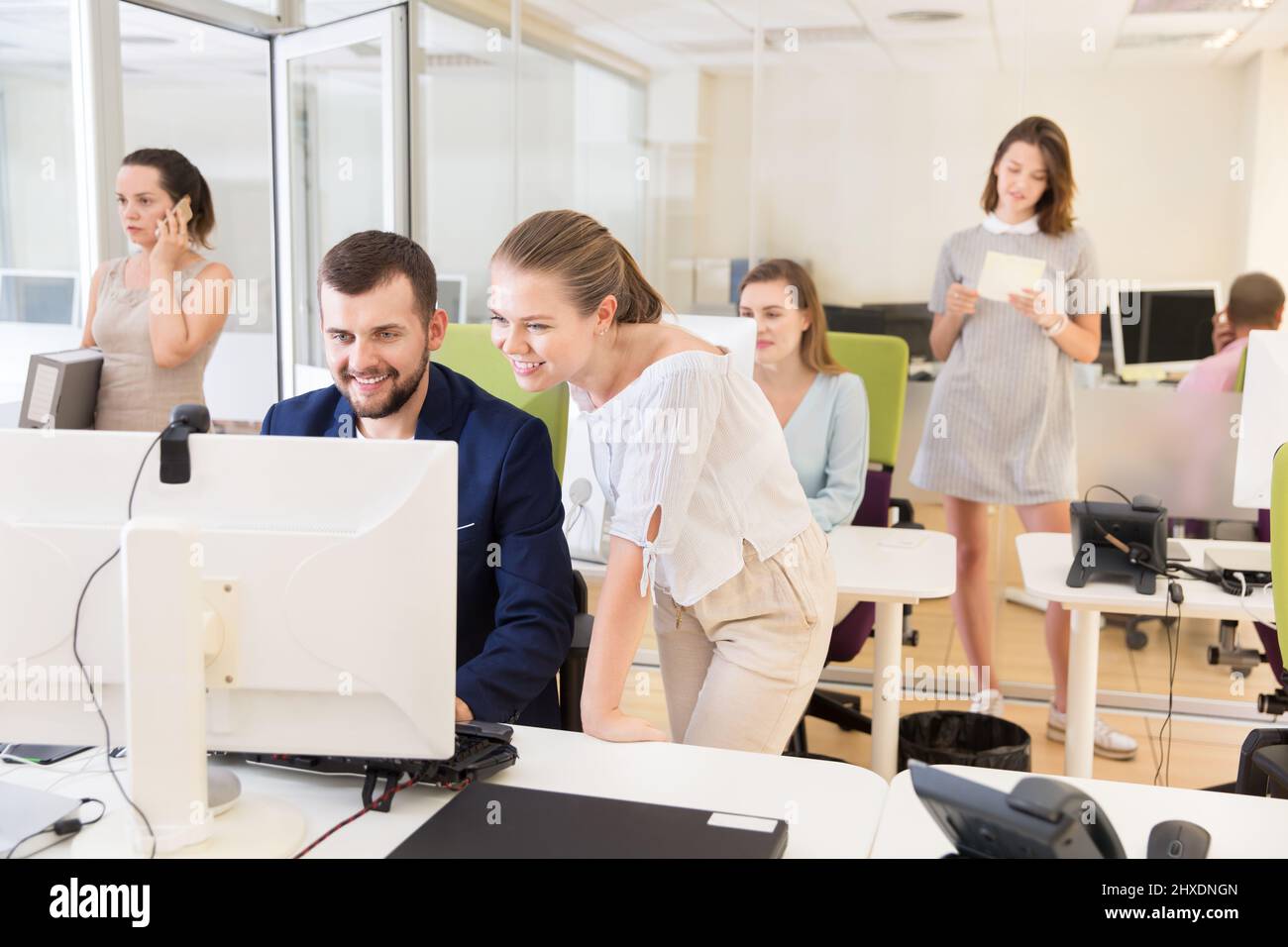 Professional start-up team working with pc and communicating Stock ...