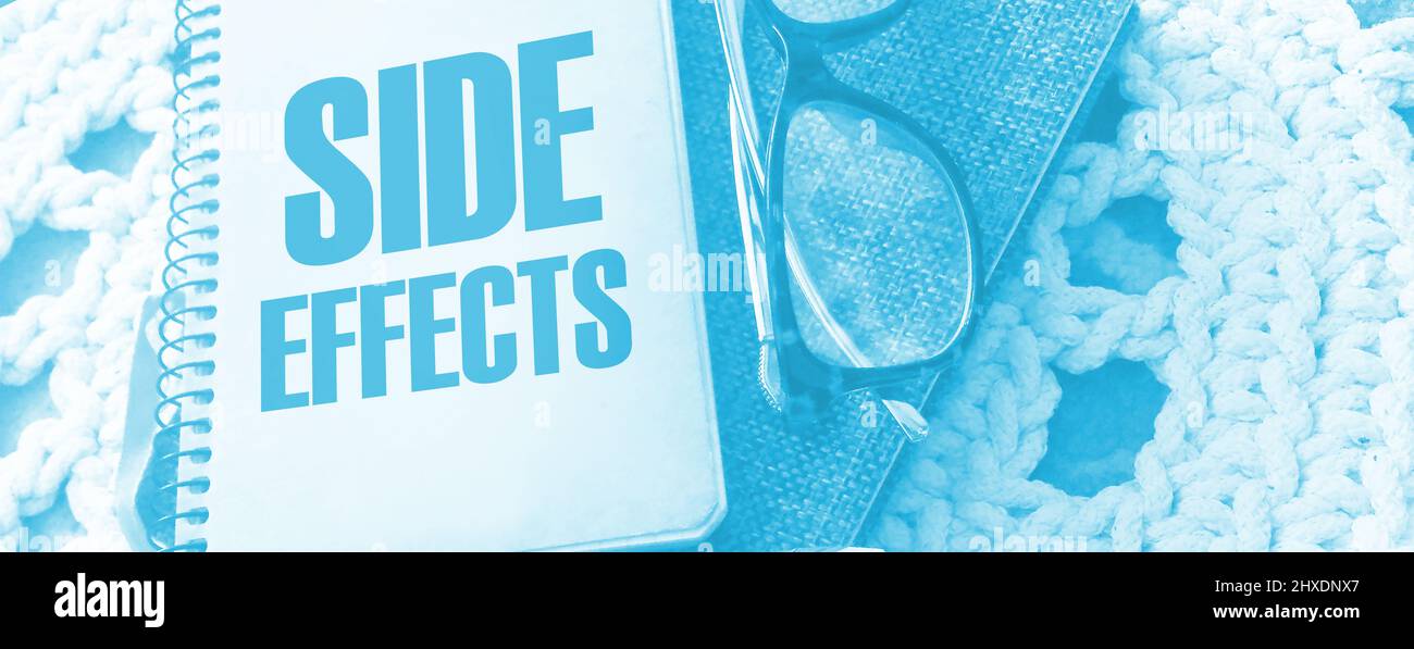 notebook with Side Effect words with glasses and pen. Healthcare ...