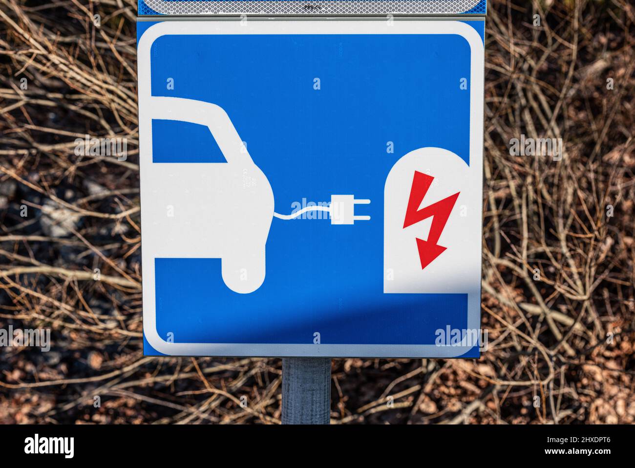 Electric car charger available sign Stock Photo - Alamy