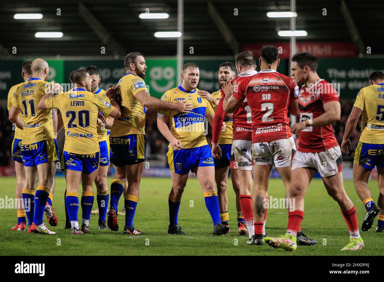 The two teams come together during the game Stock Photo - Alamy
