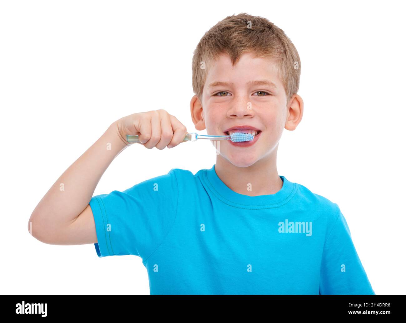 Learning hygiene early. Portrait of a young boy brushing his teeth ...