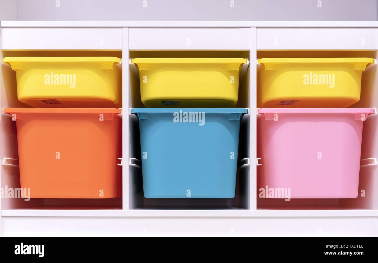 Multi-colored plastic containers for storing children's things Stock ...