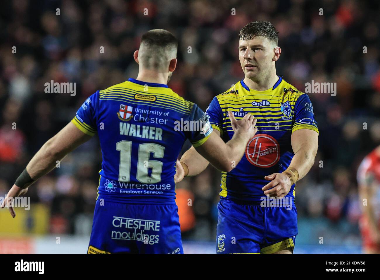 Danny Walker #16 of Warrington Wolves and George Williams #7 of ...