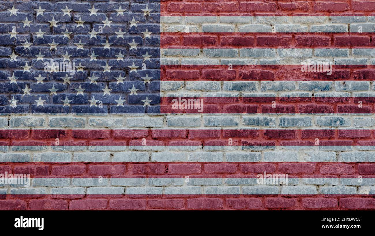 Flags of USA on brick wall background on town street. Exterior old ...