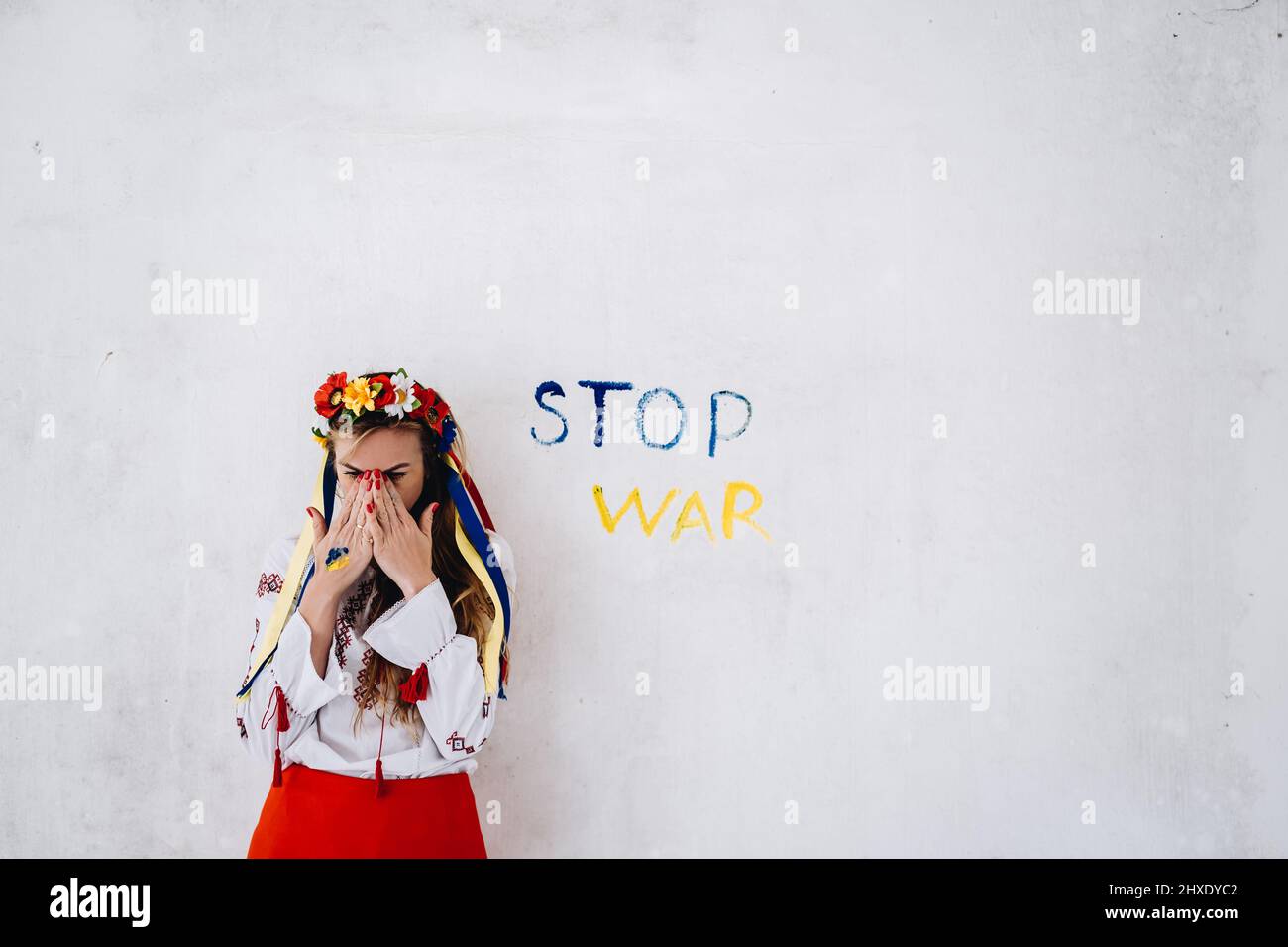 Ukrainian girl sad crying war in Ukraine. Stop war Stock Photo - Alamy
