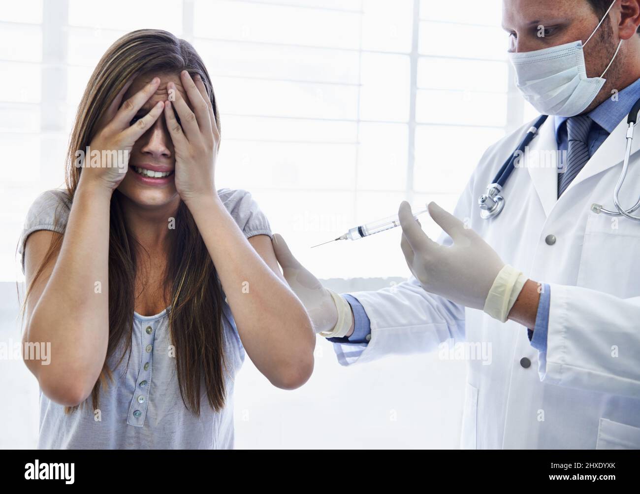 Doctor injection woman hi-res stock photography and images - Alamy