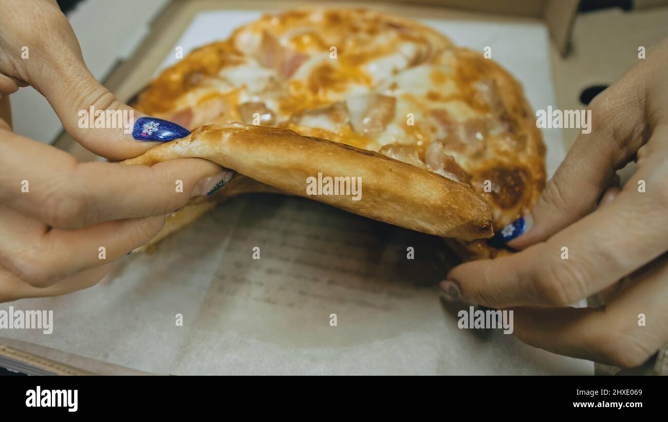 Girl eat pizza cheese four. Close up of young woman mouth greedily ...
