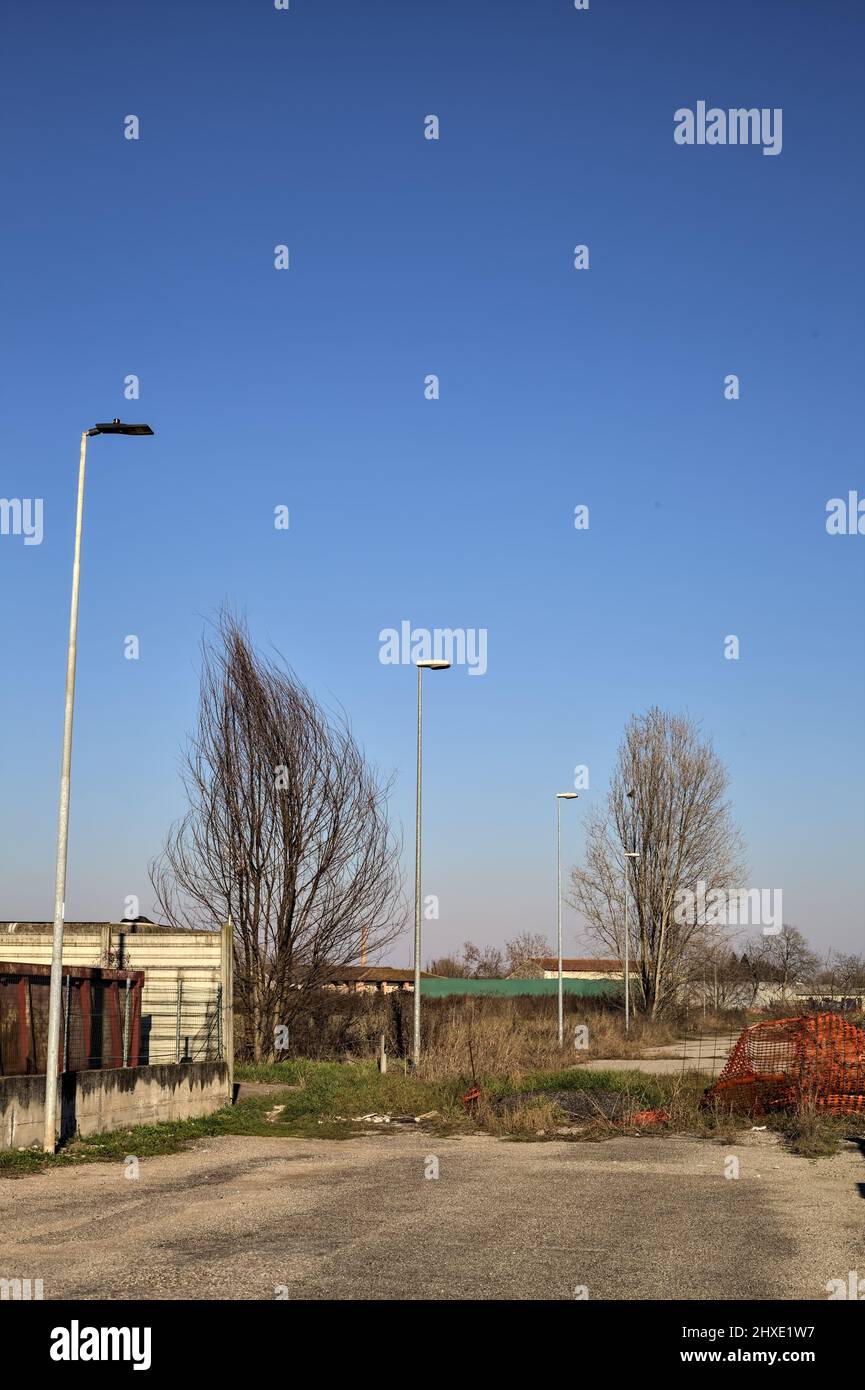 Blocked road between buildings in the countryside Stock Photo - Alamy