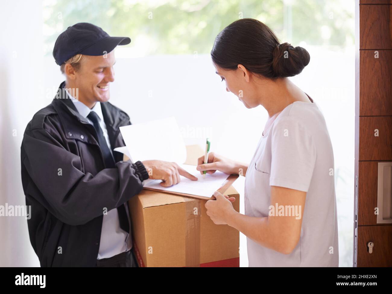Sign here please. A y Stock Photo - Alamy