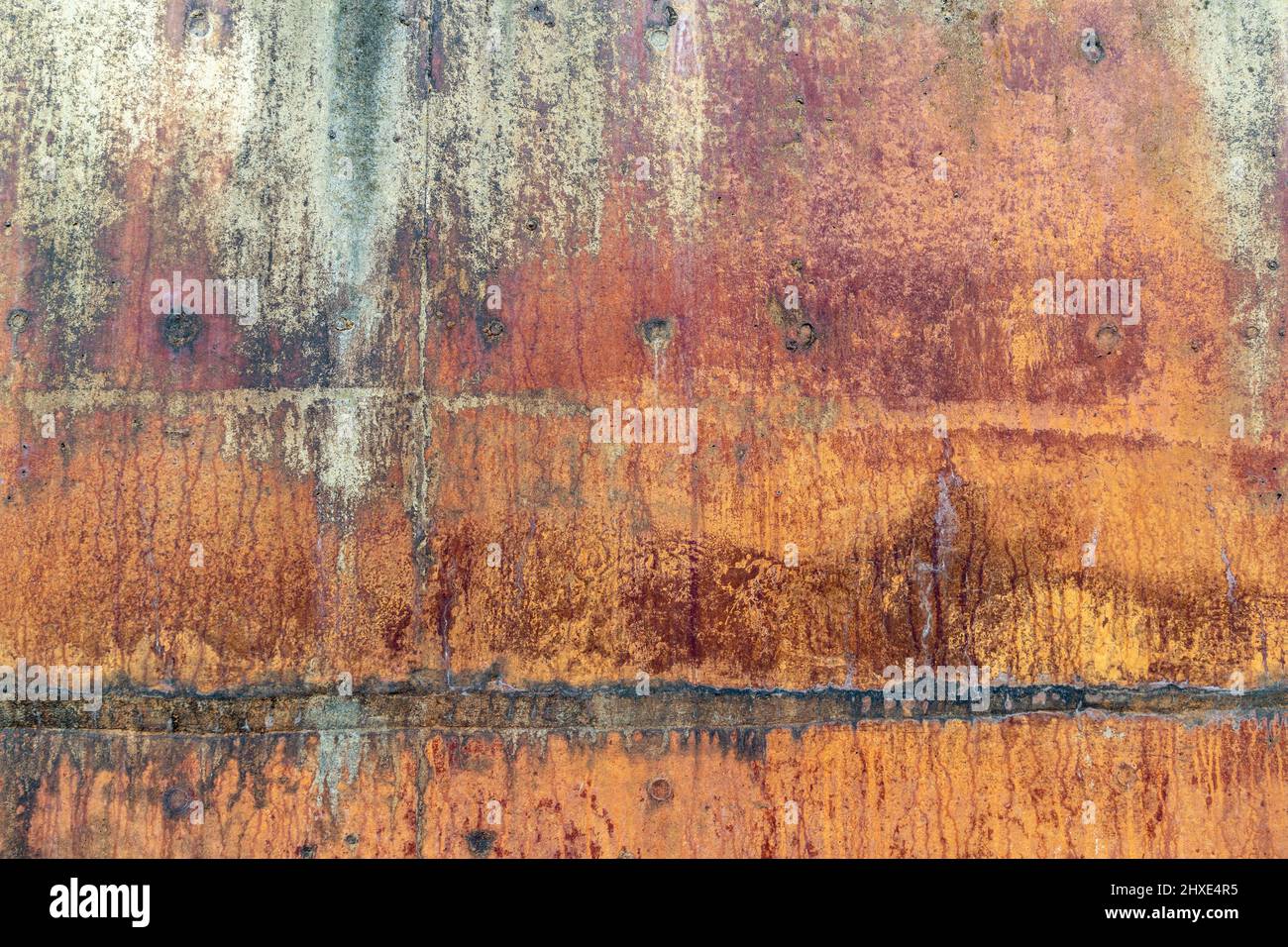 Rusty stained and marked stone wall for texture or background Stock ...