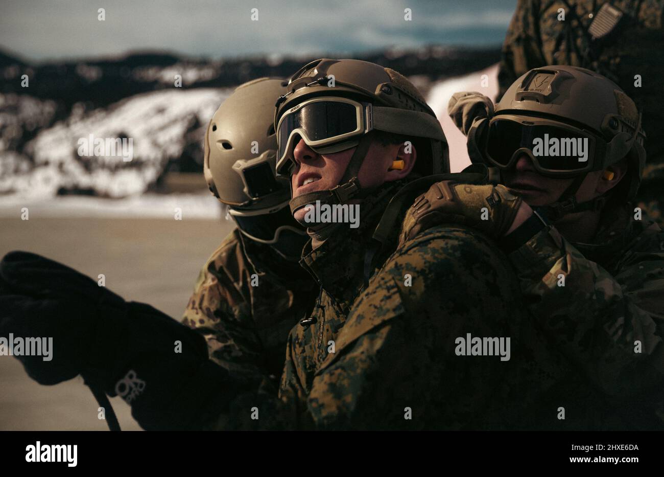 U.S. Marines and soldiers attending the Mountain Medicine Course hold a ...