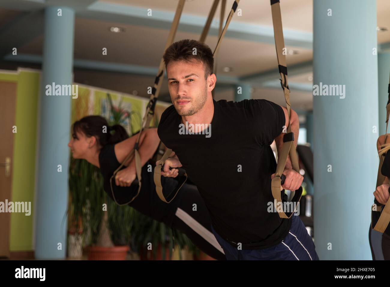 Functional Fitness Workout in Sport Gym With Suspension Training Trx ...