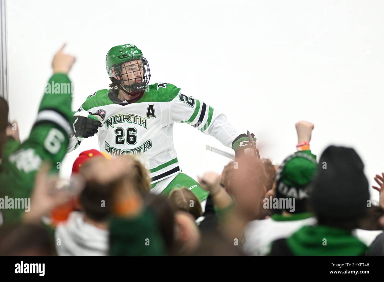 North Dakota Fighting Hawks defenseman Jake Sanderson (26) celebrates ...